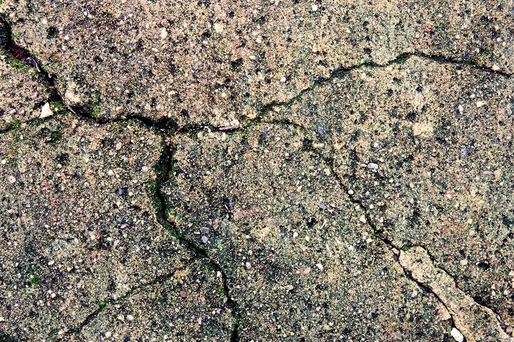 Dalle de béton fissurée : Réparation, prix au m² | Ootravaux